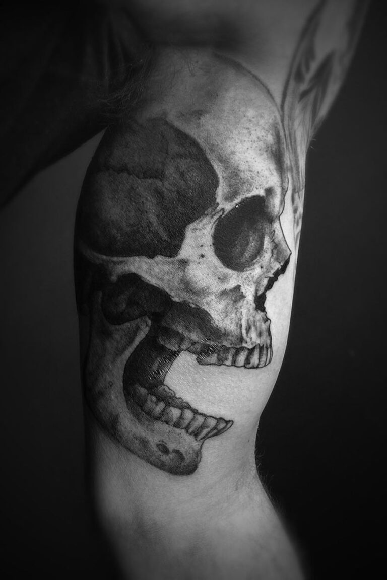 28 Striking Bicep Tattoo Men Designs To Showcase Your Style