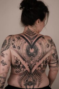 37 Women’s Back Tattoos: Stunning Designs That Tell A Story