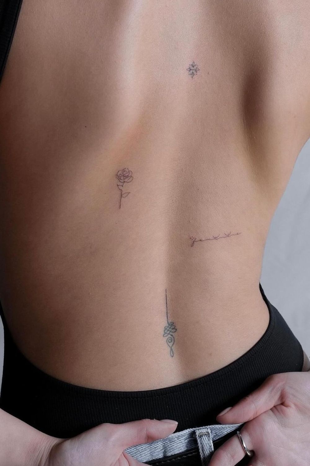 30 Stunning Small Back Tattoos That Will Inspire Your Next Ink