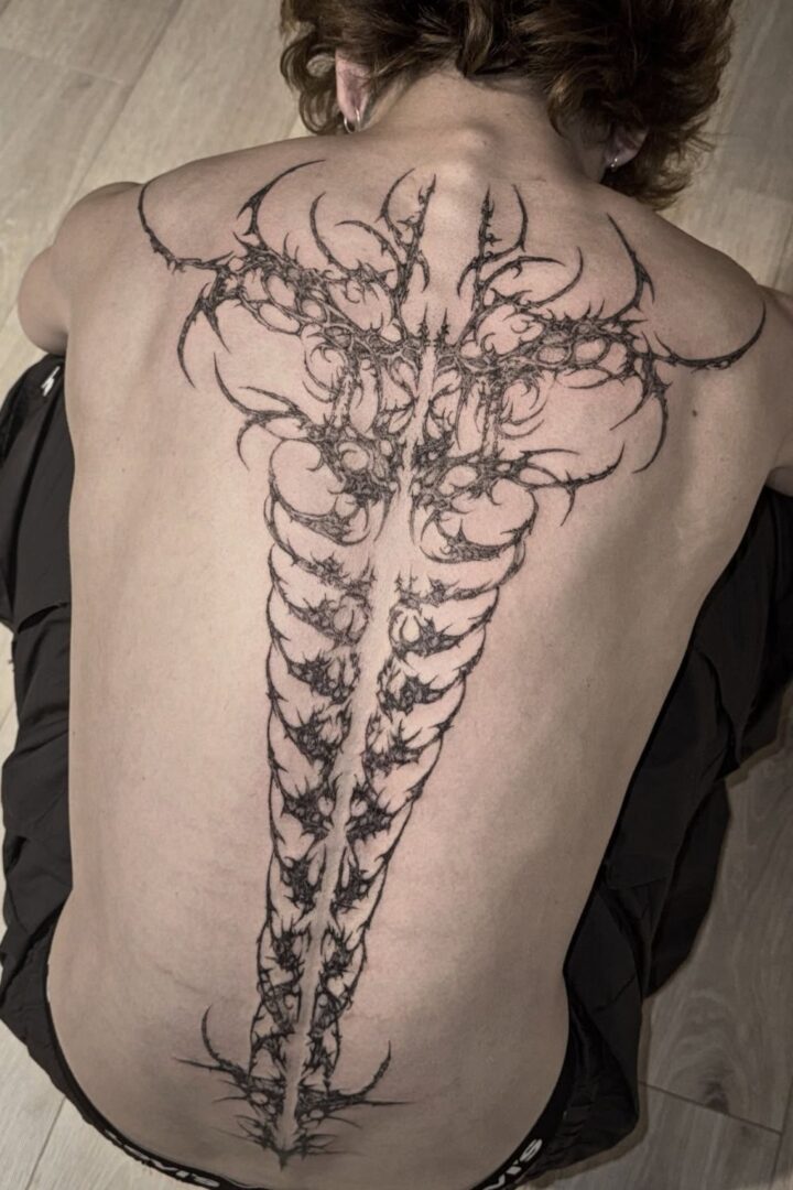15 Epic Back Tattoos For Guys That Make A Statement