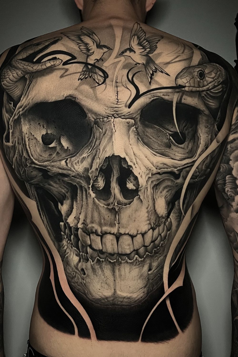 15 Epic Back Tattoos For Guys That Make A Statement
