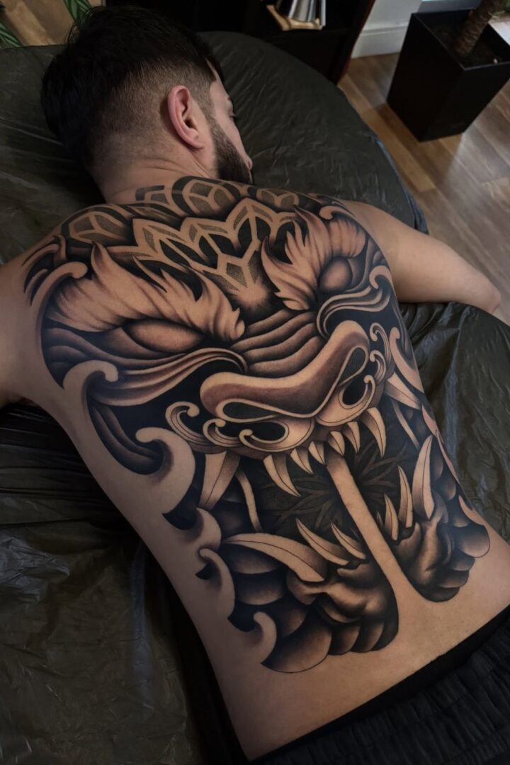 15 Epic Back Tattoos For Guys That Make A Statement