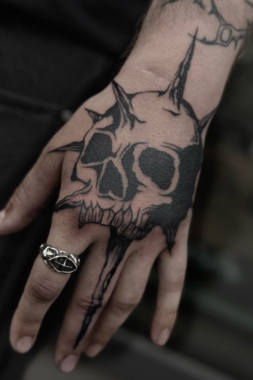 20 Bold And Meaningful Hand Tattoos For Guys