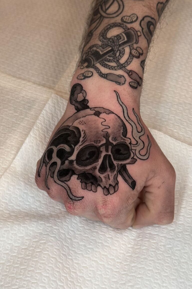 20 Bold And Meaningful Hand Tattoos For Guys