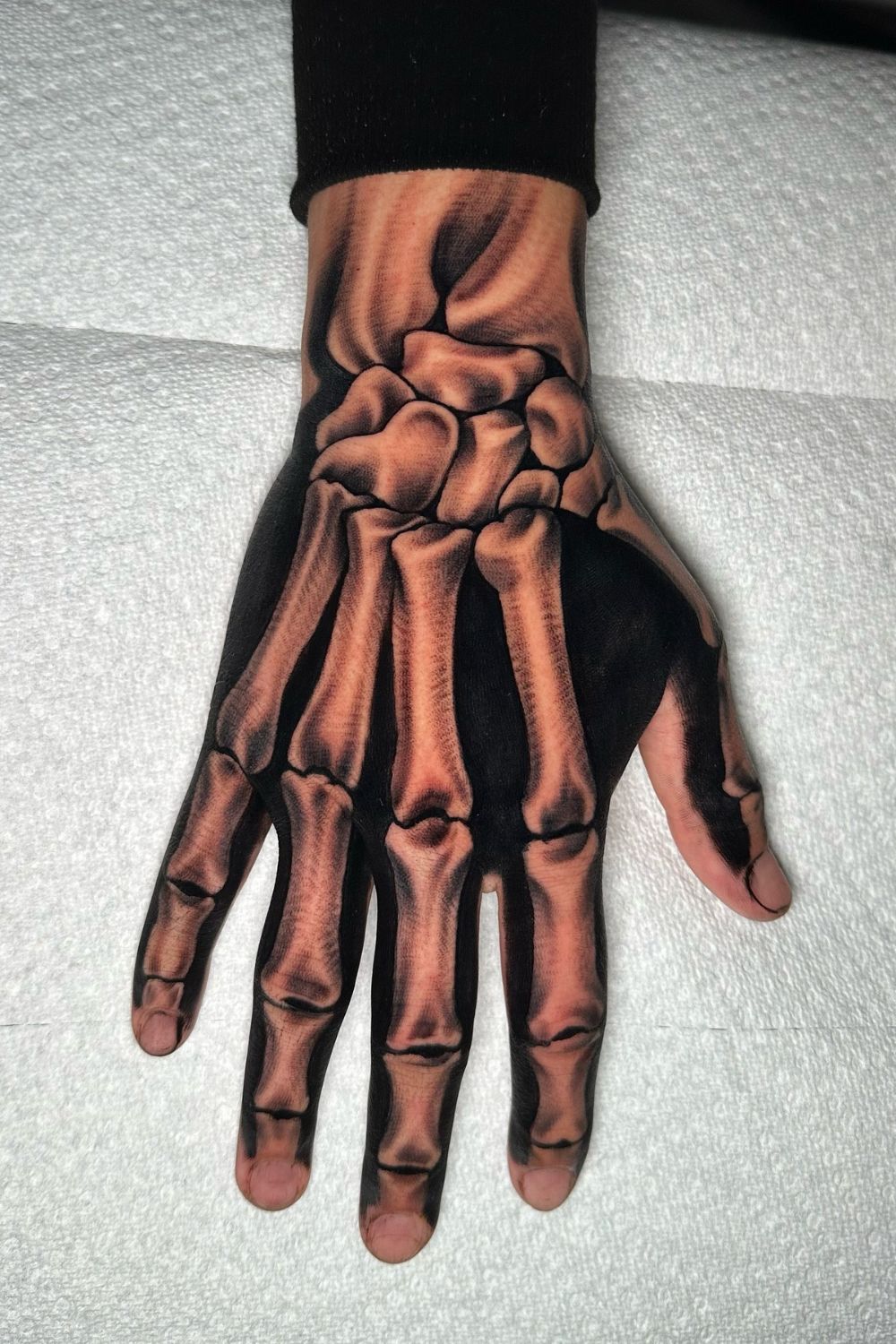 14 Skull Hand Tattoo Inspiration You’ll Want To Steal