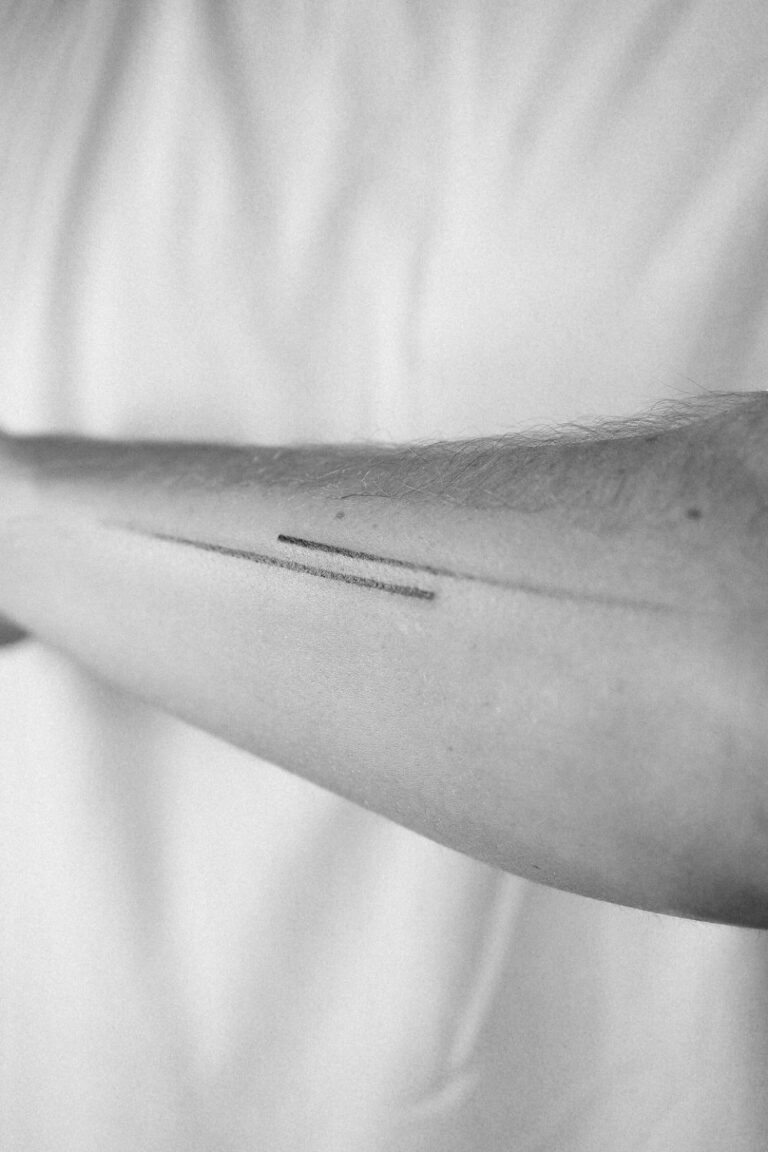 16 Small Tattoos For Men That Speak Volumes