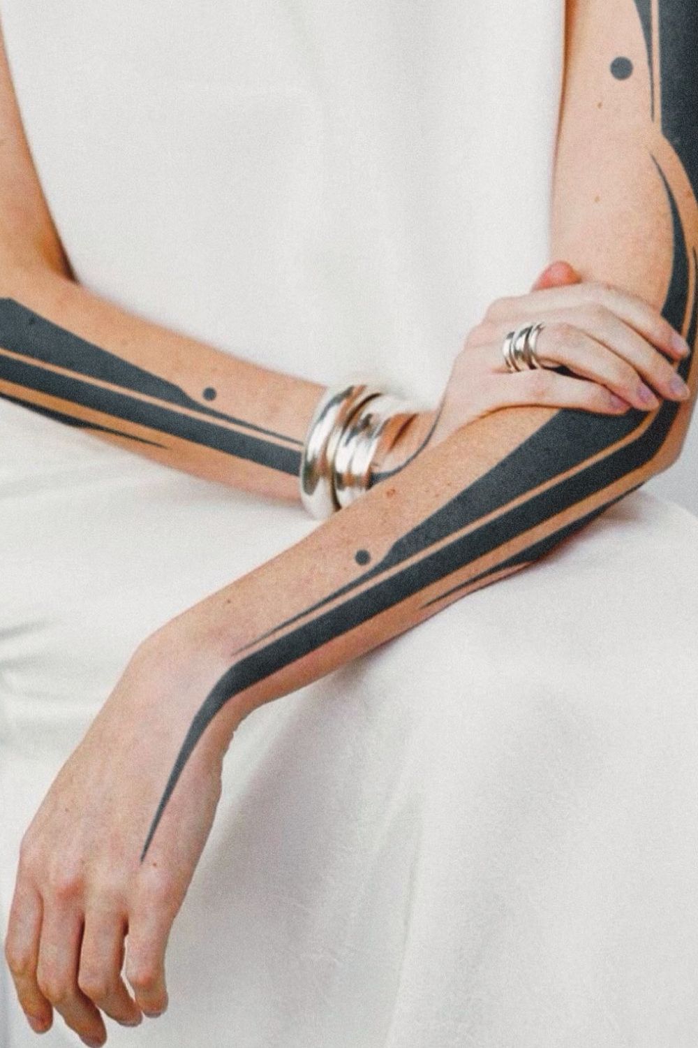 21 Elegant And Powerful Lower Arm Tattoos For Women