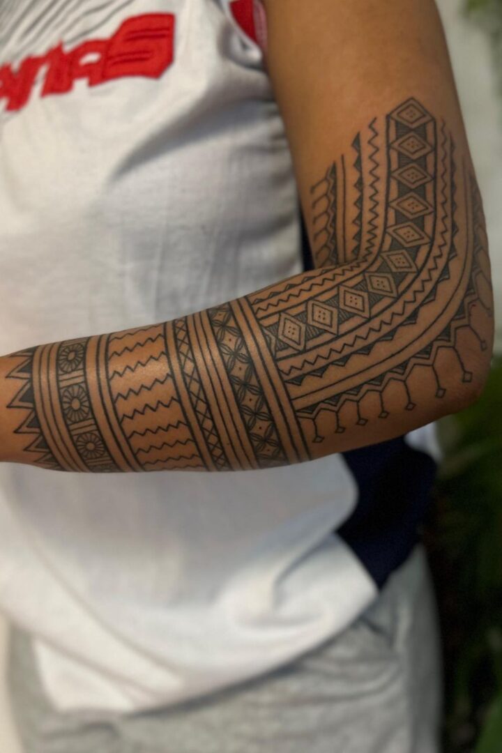 21 Elegant And Powerful Lower Arm Tattoos For Women