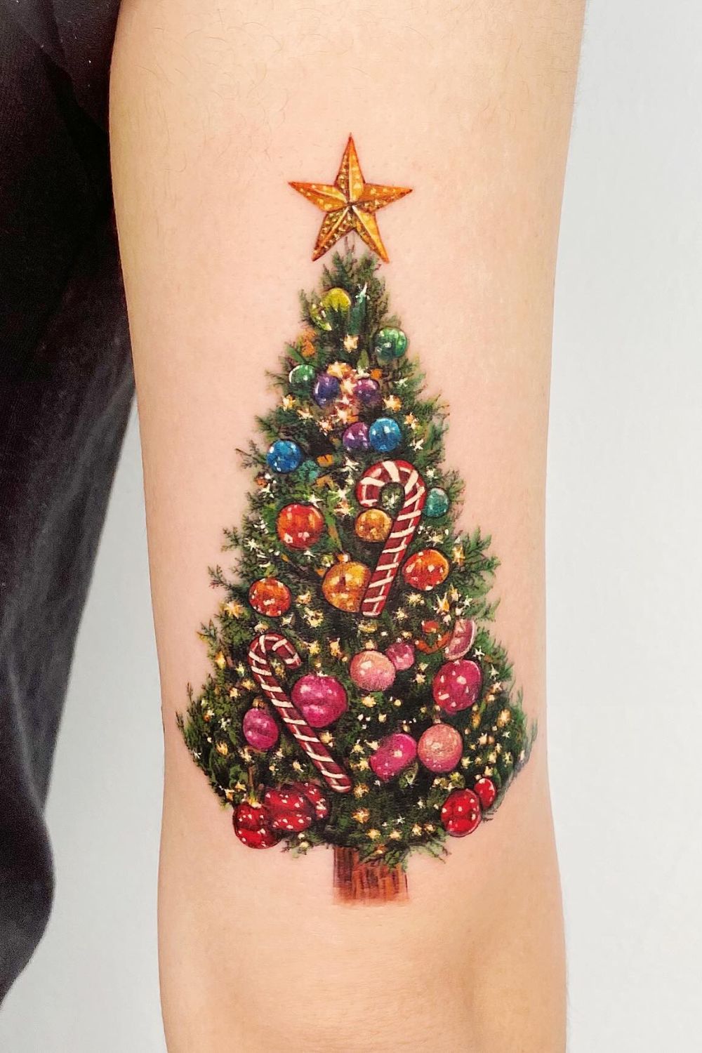 31 Unique Christmas Tattoo Inspiration For Festive Ink