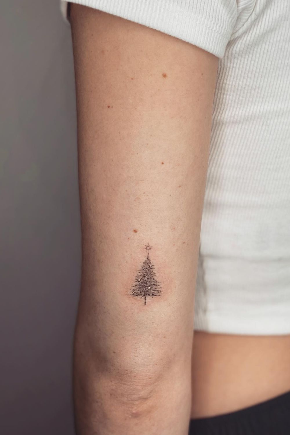 31 Unique Christmas Tattoo Inspiration For Festive Ink